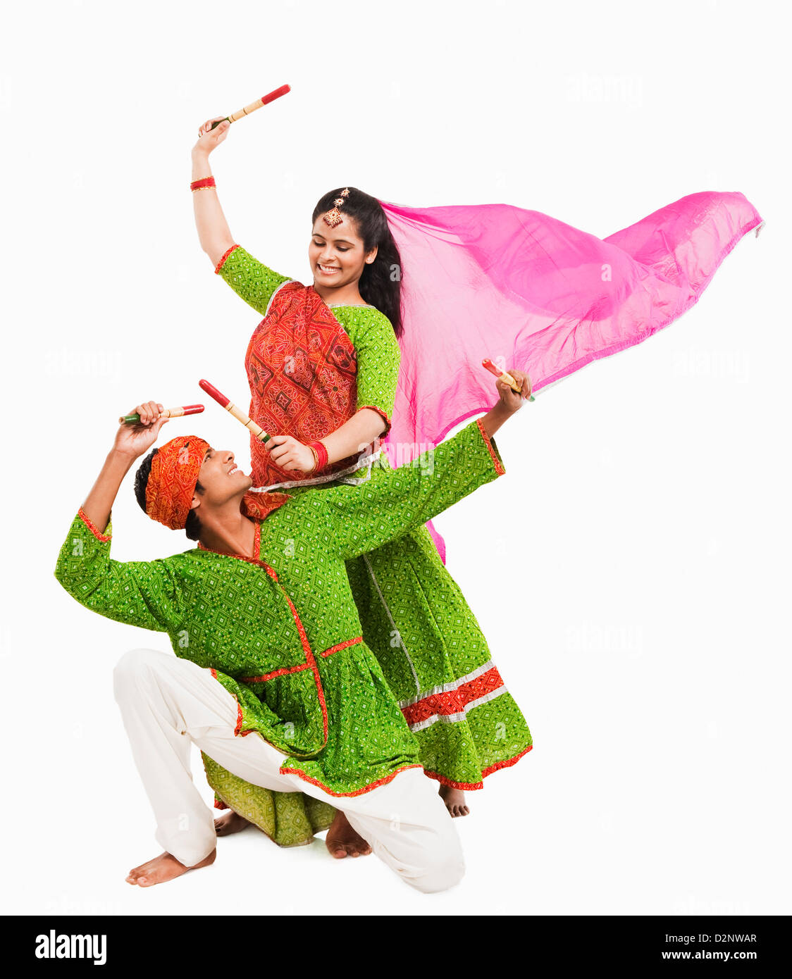 Women performing traditional dandiya dance hi-res stock photography and ...