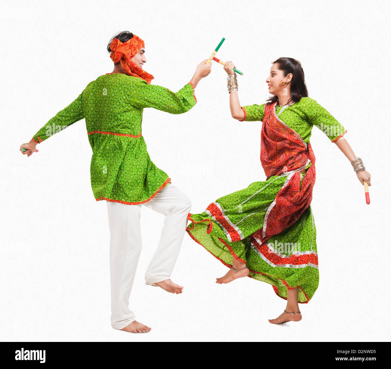 Couple performing dandiya hi-res stock photography and images - Alamy