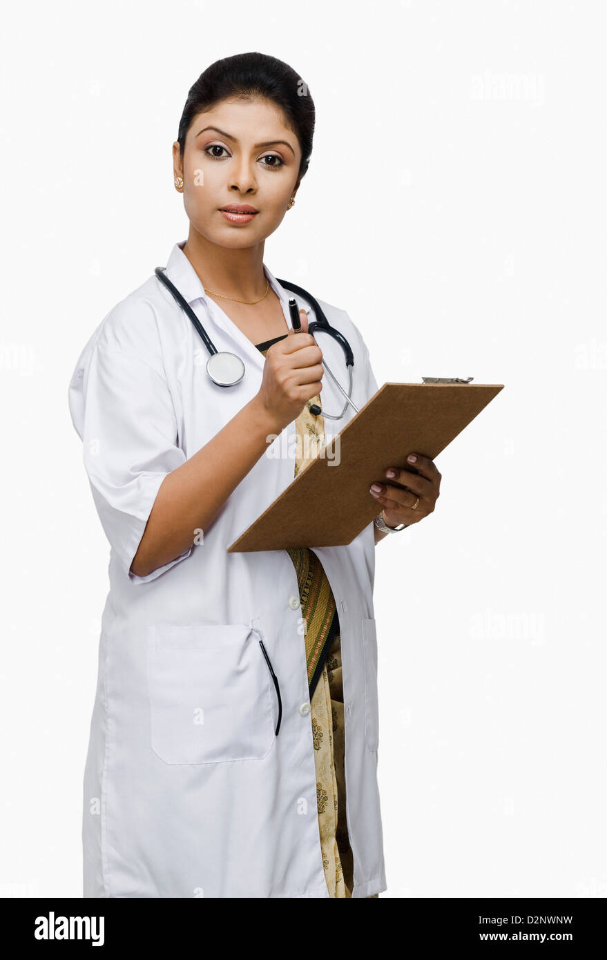 Female doctor holding a clipboard Stock Photo - Alamy