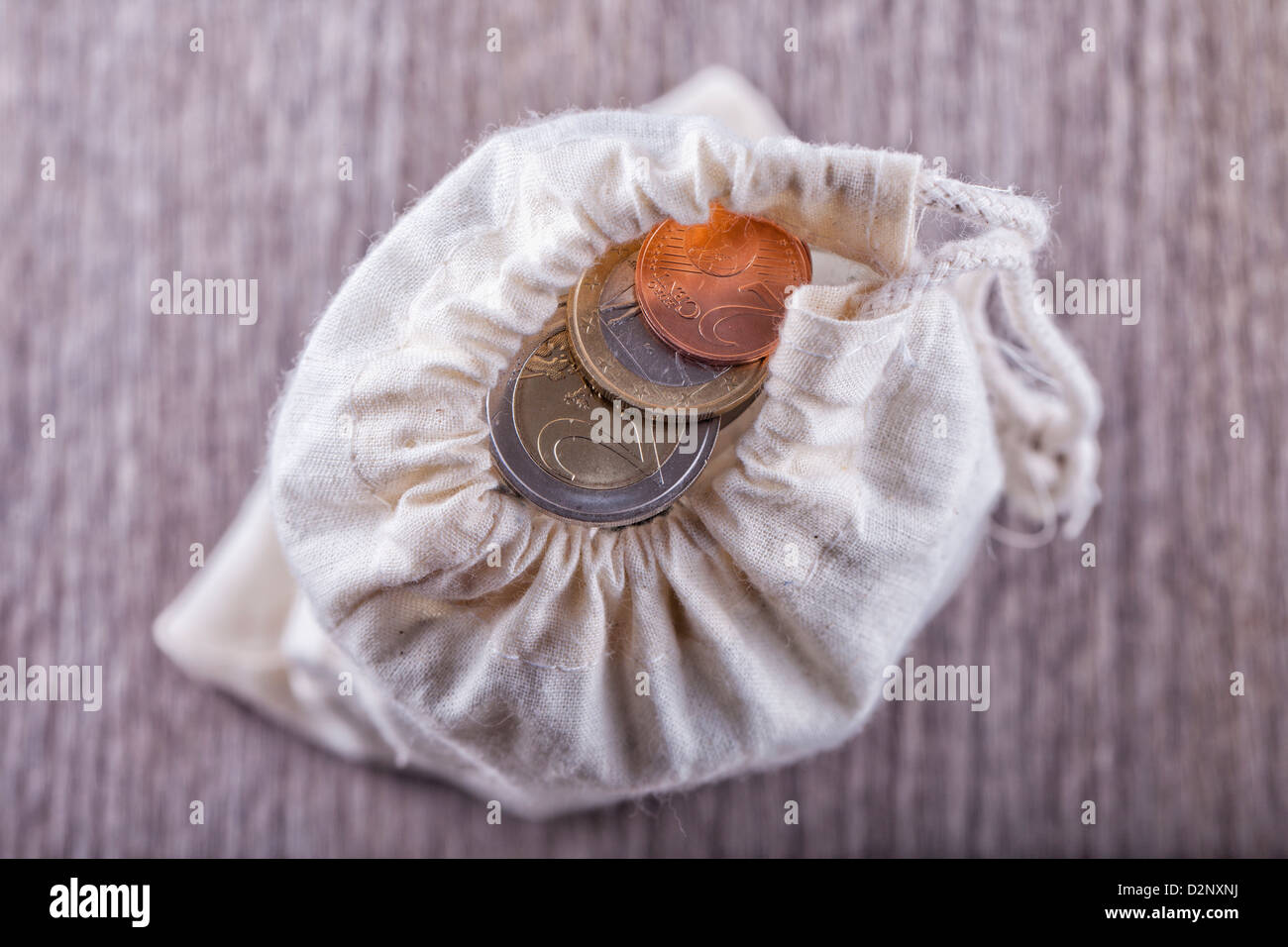 Sack full of money seen from above Stock Photo - Alamy