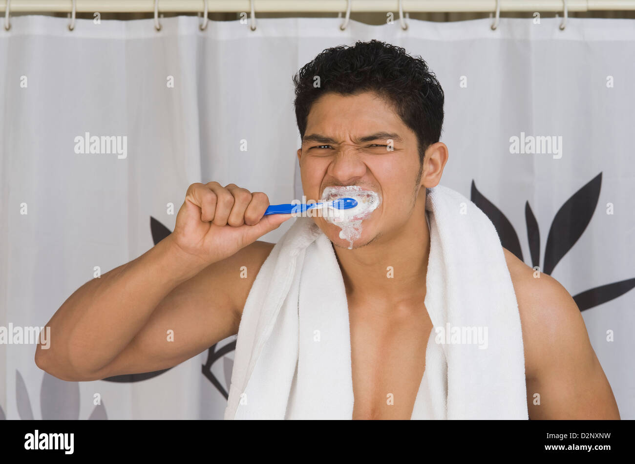 Man brushing teeth Stock Photo - Alamy