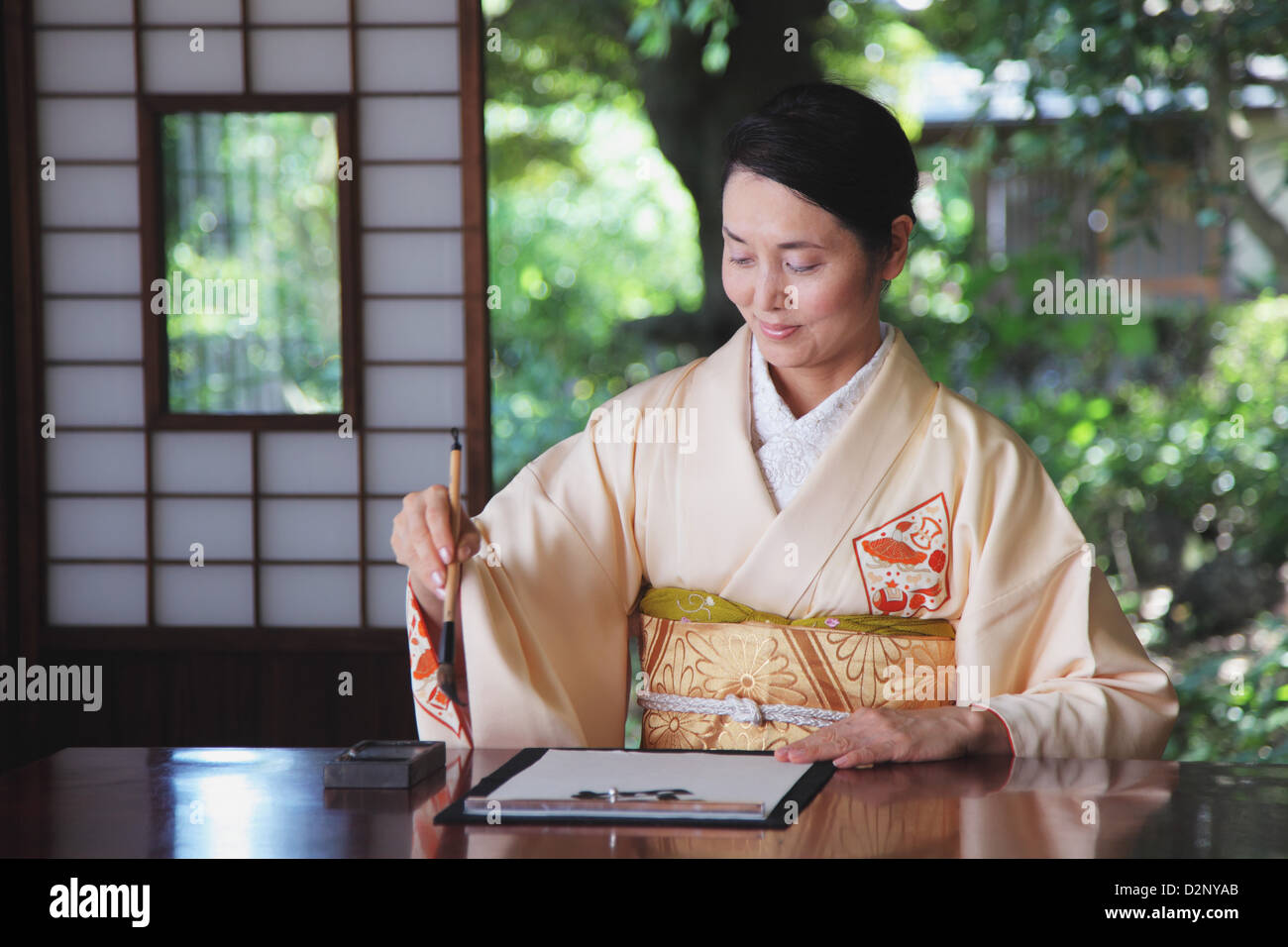 Japanese calligraphy lesson hi-res stock photography and images - Alamy