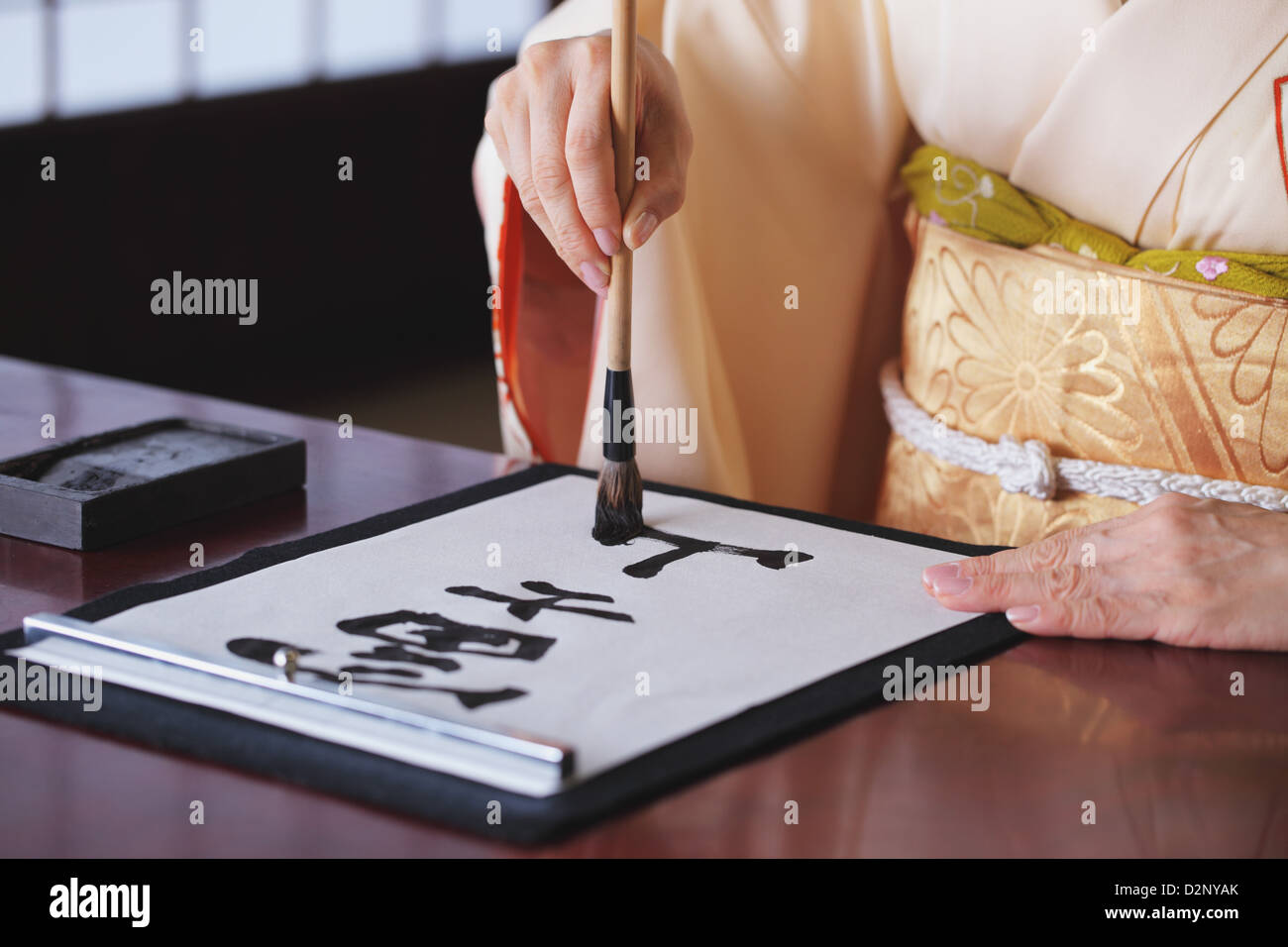 Japanese calligraphy lesson hi-res stock photography and images - Alamy