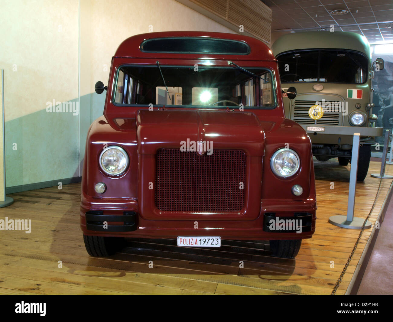 An Italian police car and FIAT police van, representing Italy's law ...