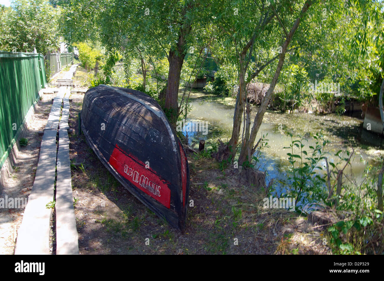 Boat on canal in Vilkovo or Vylkove, also known as "Ukrainian Venice ...