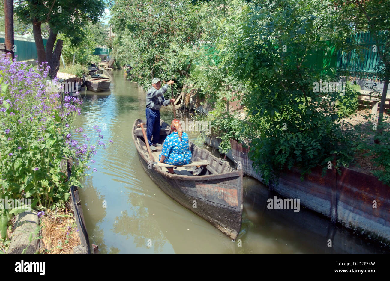 Boat on canal in Vilkovo or Vylkove, also known as "Ukrainian Venice ...