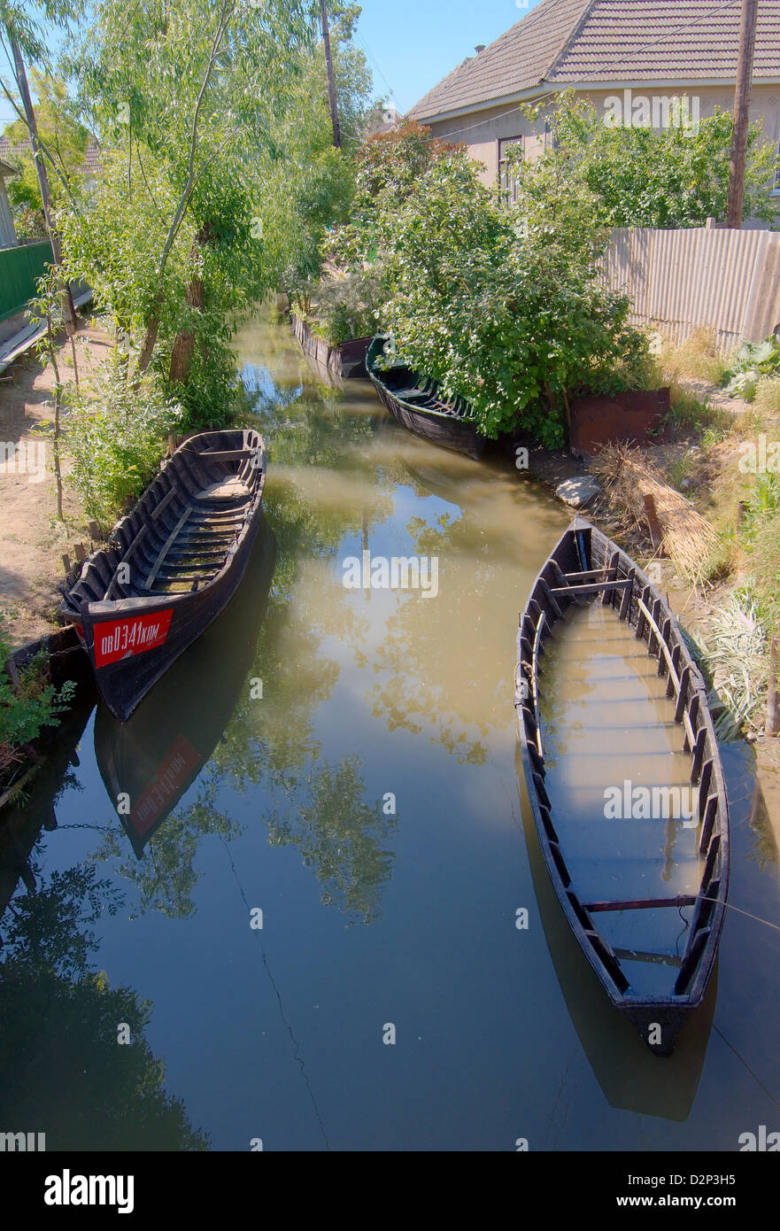 Boat on canal in Vilkovo or Vylkove, also known as "Ukrainian Venice ...