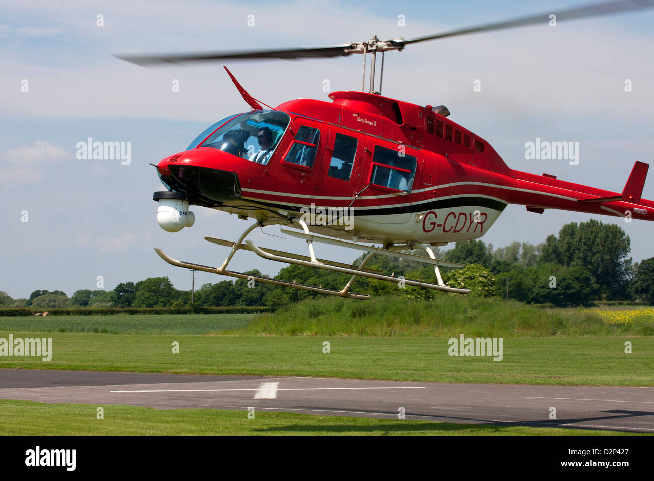 Bell 206L-3 Longranger III G-CDYR helicopter hovering over runway at ...
