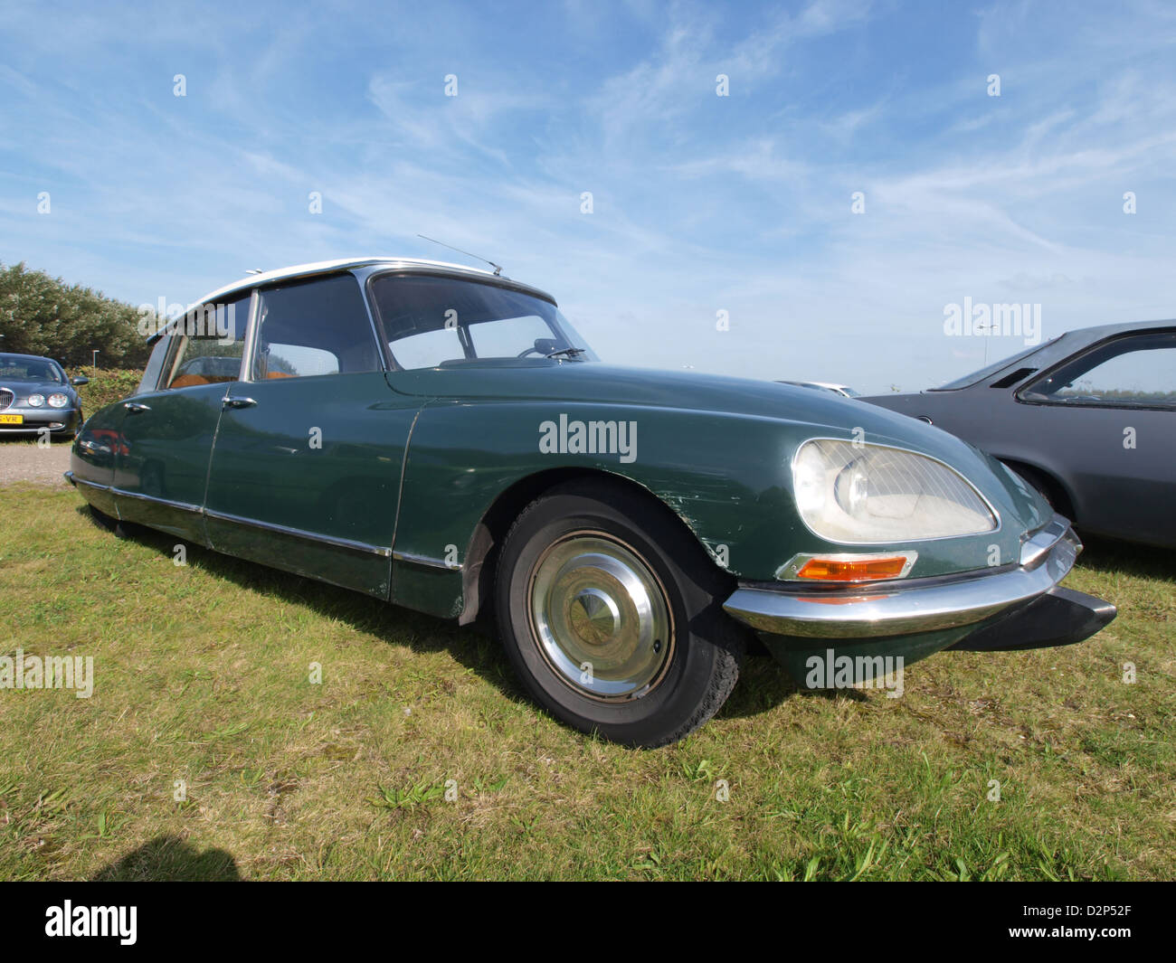 The Green Citroën DS is a vintage French car known for its ...