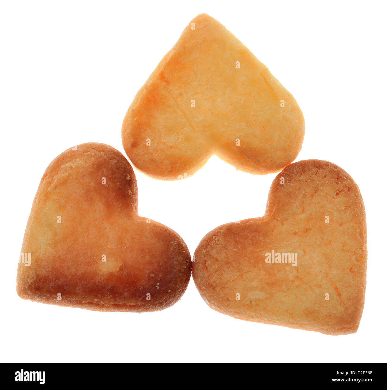 Three heart-shaped cookies isolated against a white background Stock ...