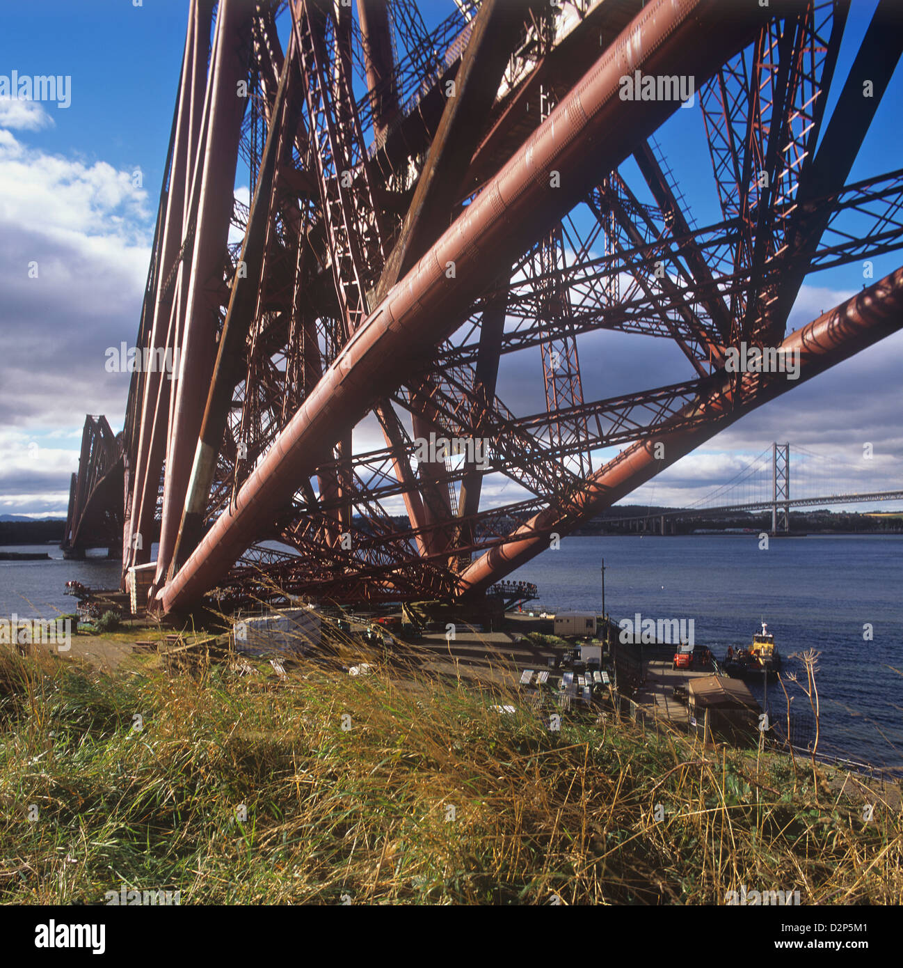 The massive steel cantilevers of the Forth Rail Bridge near Edinburhj ...