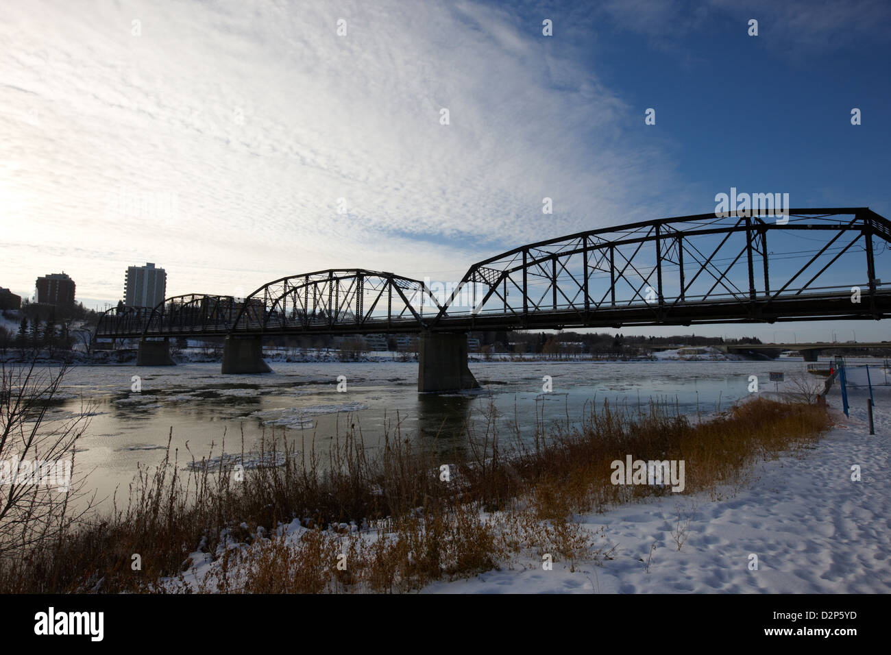 the old traffic bridge over the south saskatchewan river in winter ...