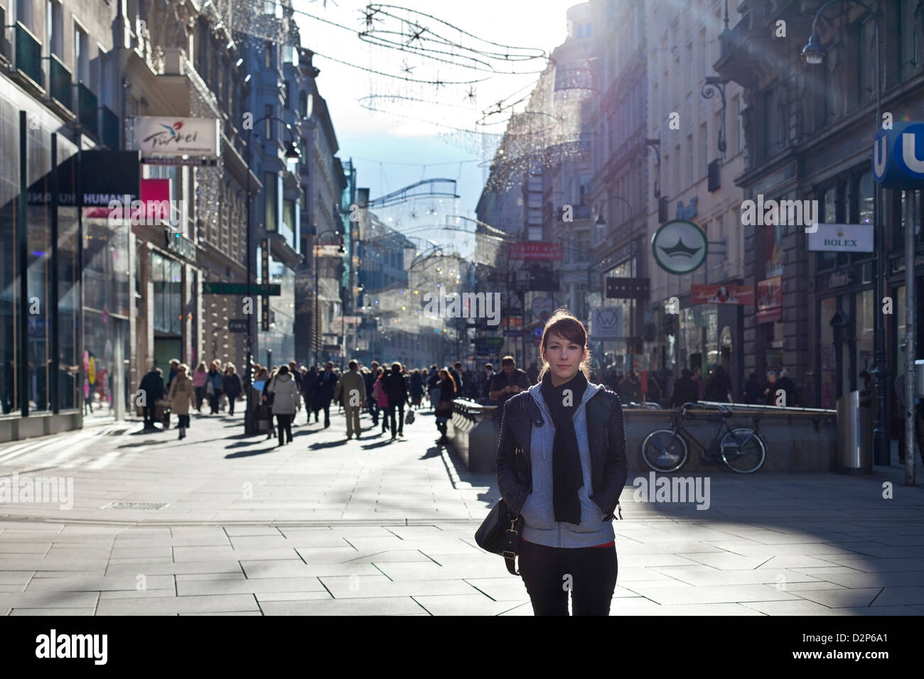 Urban girl standing out from the crowd at city street Stock Photo - Alamy