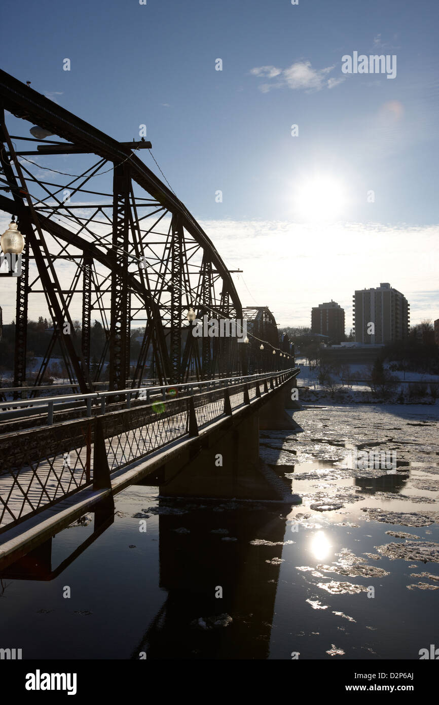 the old traffic bridge over the south saskatchewan river in winter ...