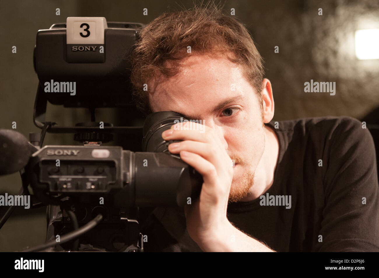 Man using a film camera hi-res stock photography and images - Alamy