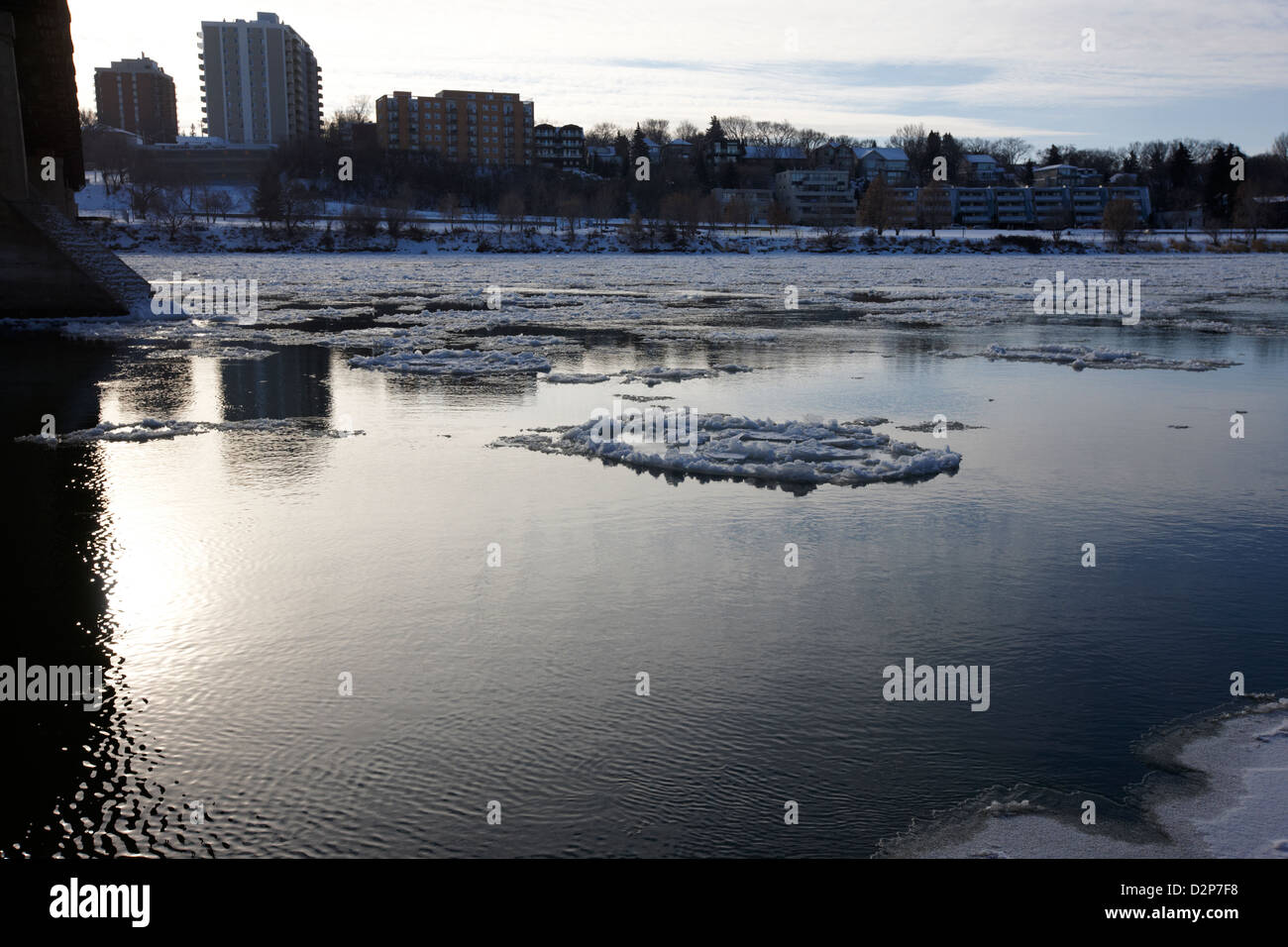 large chunks of floating ice on the south saskatchewan river in winter ...
