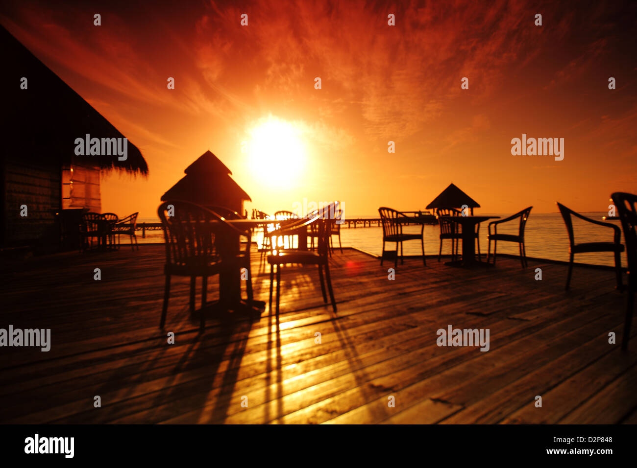 tropical cafe on the sunset Stock Photo - Alamy