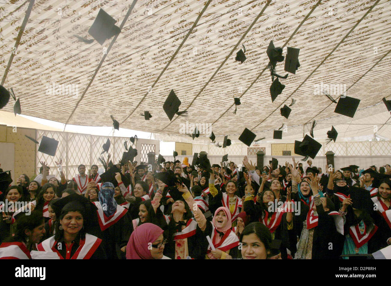 Students of Karachi University throwing their hats in air to celebrate ...
