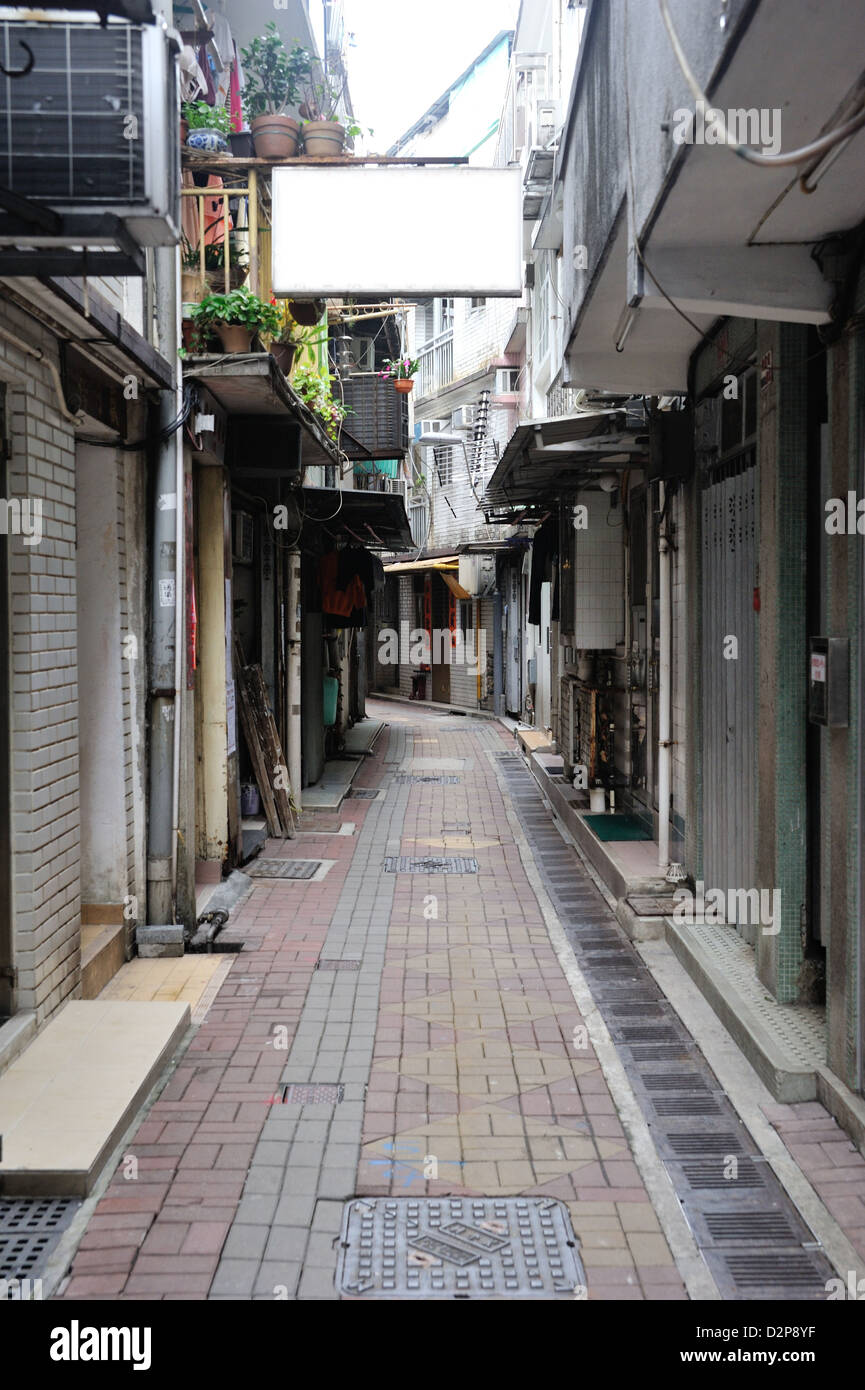 Empty alley in a village Stock Photo - Alamy