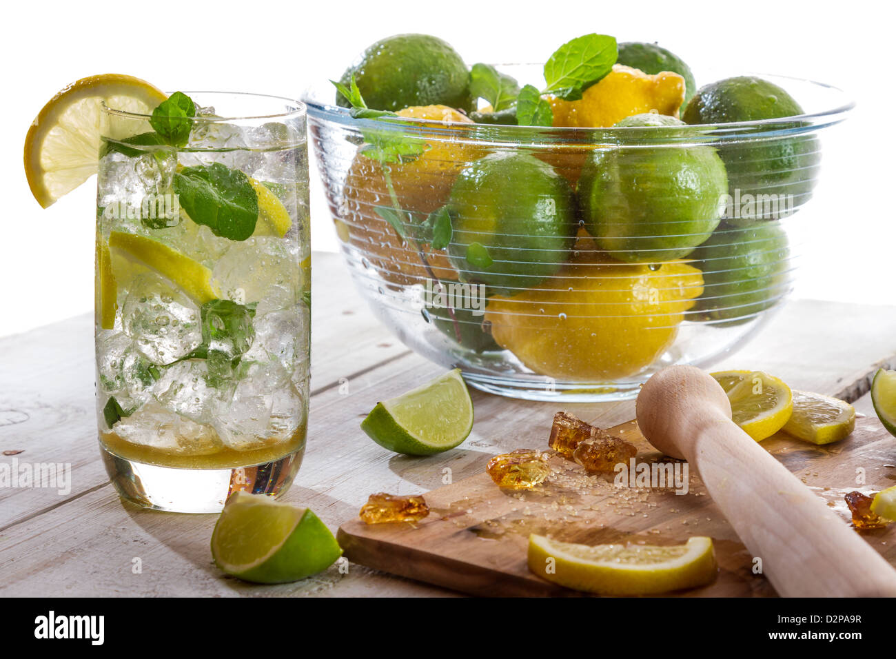 Cold drink with citrus fruit on white background Stock Photo - Alamy