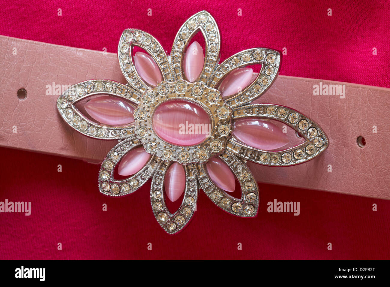 Next pink belt with sparkling pink buckle on pink clothing Stock Photo ...