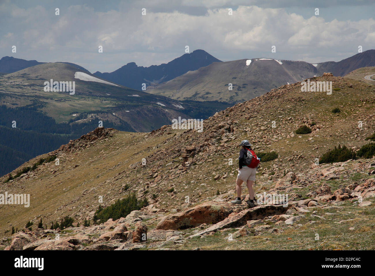 Woman on mountain peak hi-res stock photography and images - Alamy