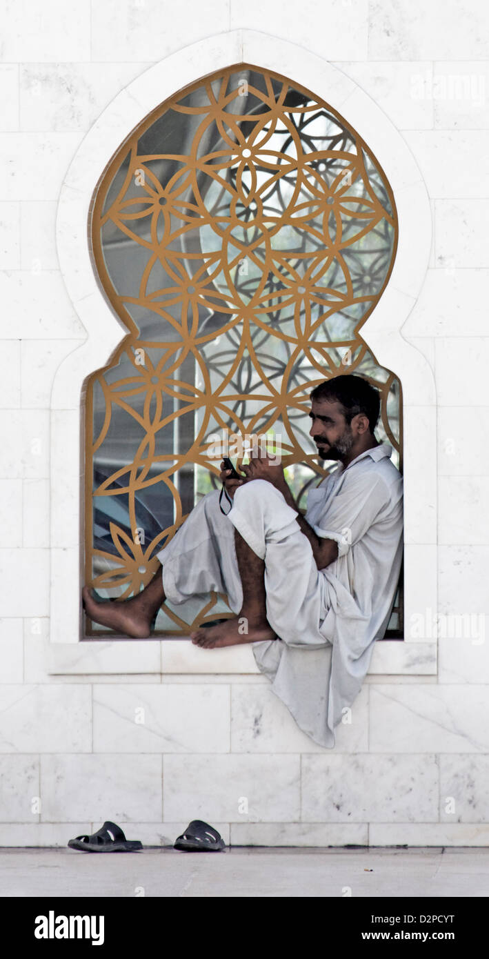Sheikh Zayed Mosque, Abu Dhabi - Cleaner taking a break in one of the ...