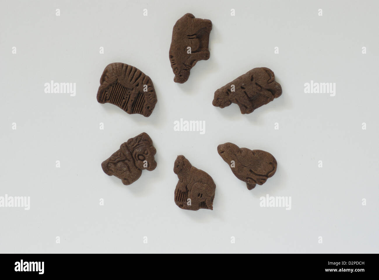 Chocolate Animal Shaped cookies on white background with shadows, zebra ...