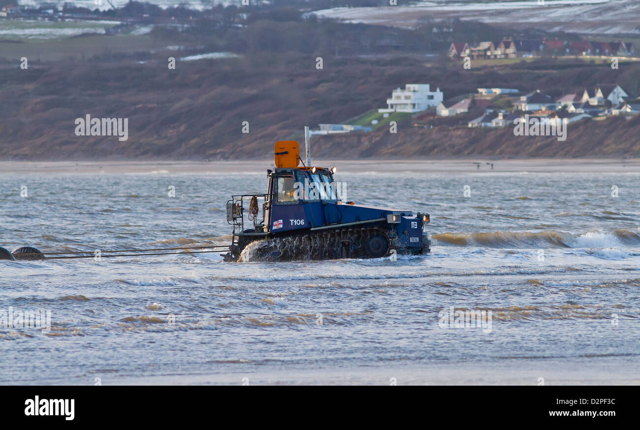 the filey lifeboat tractor is been put into action Stock Photo - Alamy