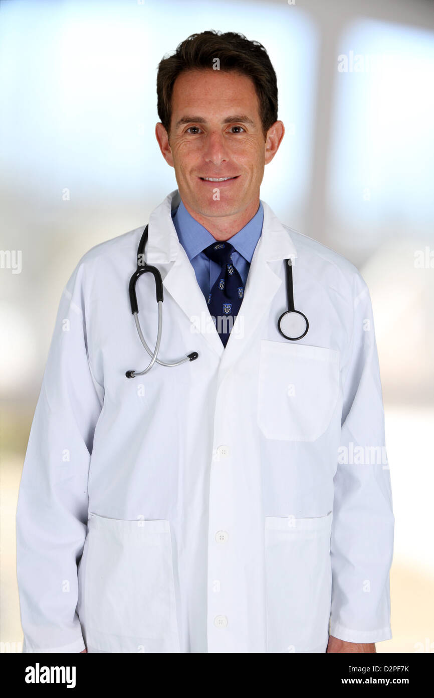 Caucasian male doctor working in a hospital Stock Photo - Alamy