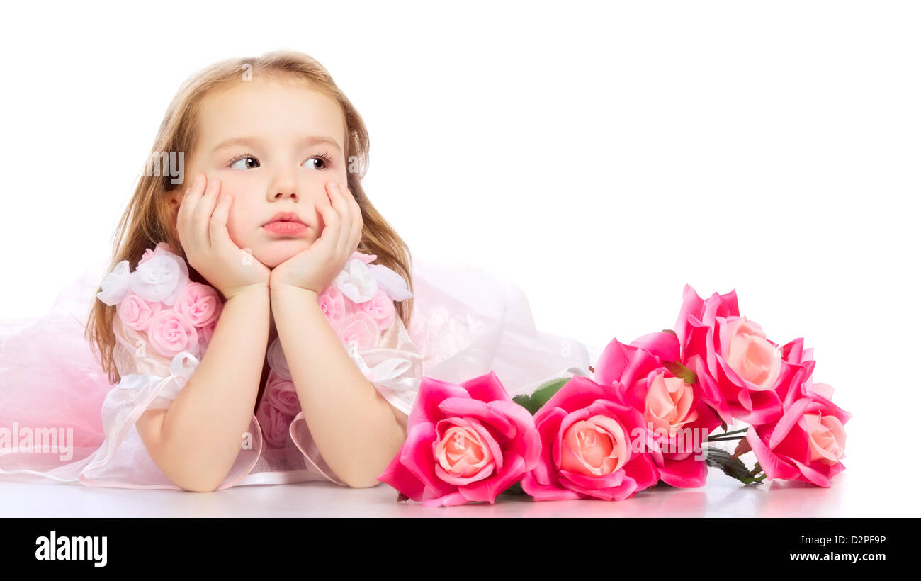 beautiful little girl with red rose bouquet Stock Photo - Alamy