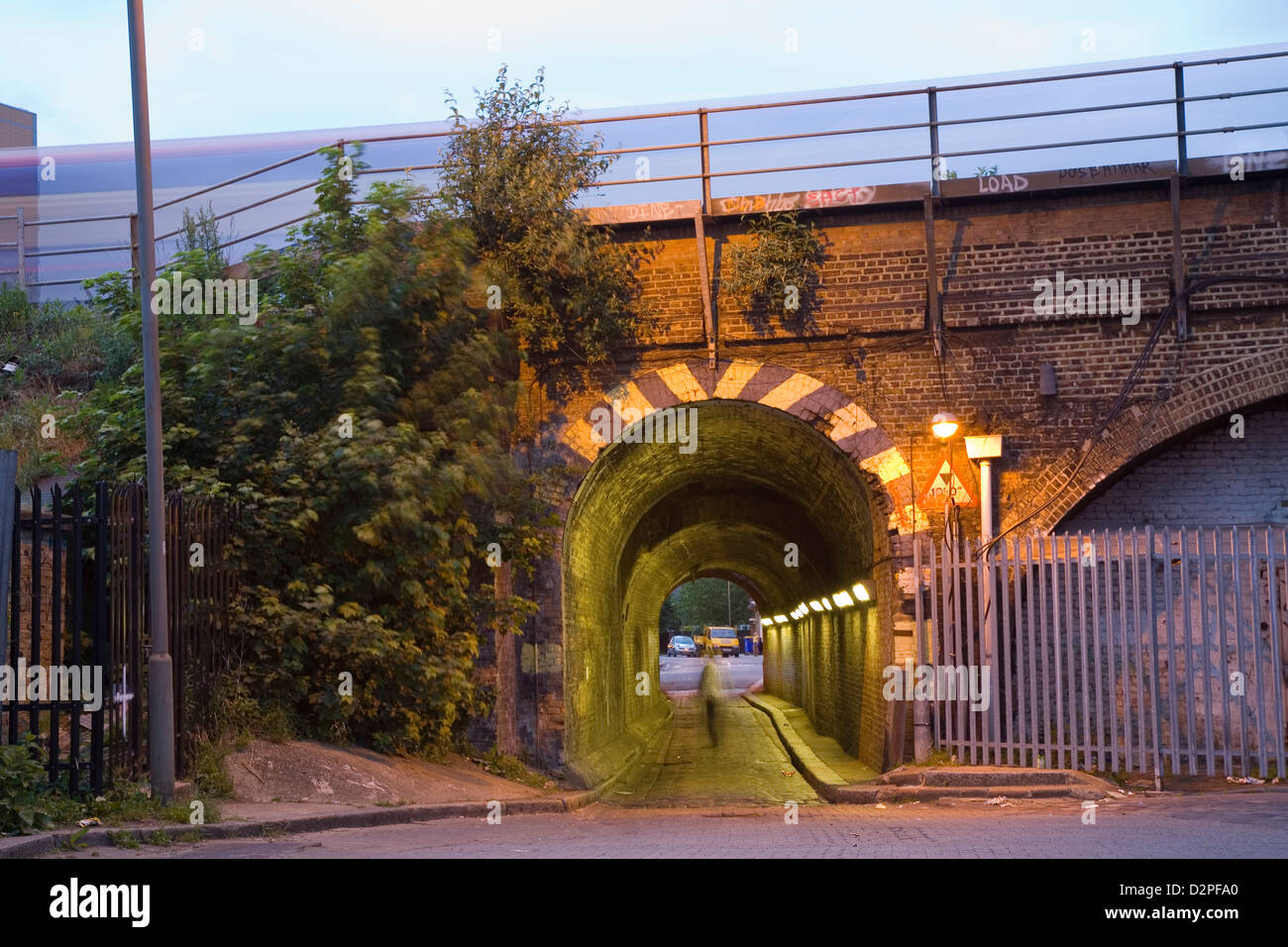 Slow shutter speed absract urban landscape at twilight with a train ...