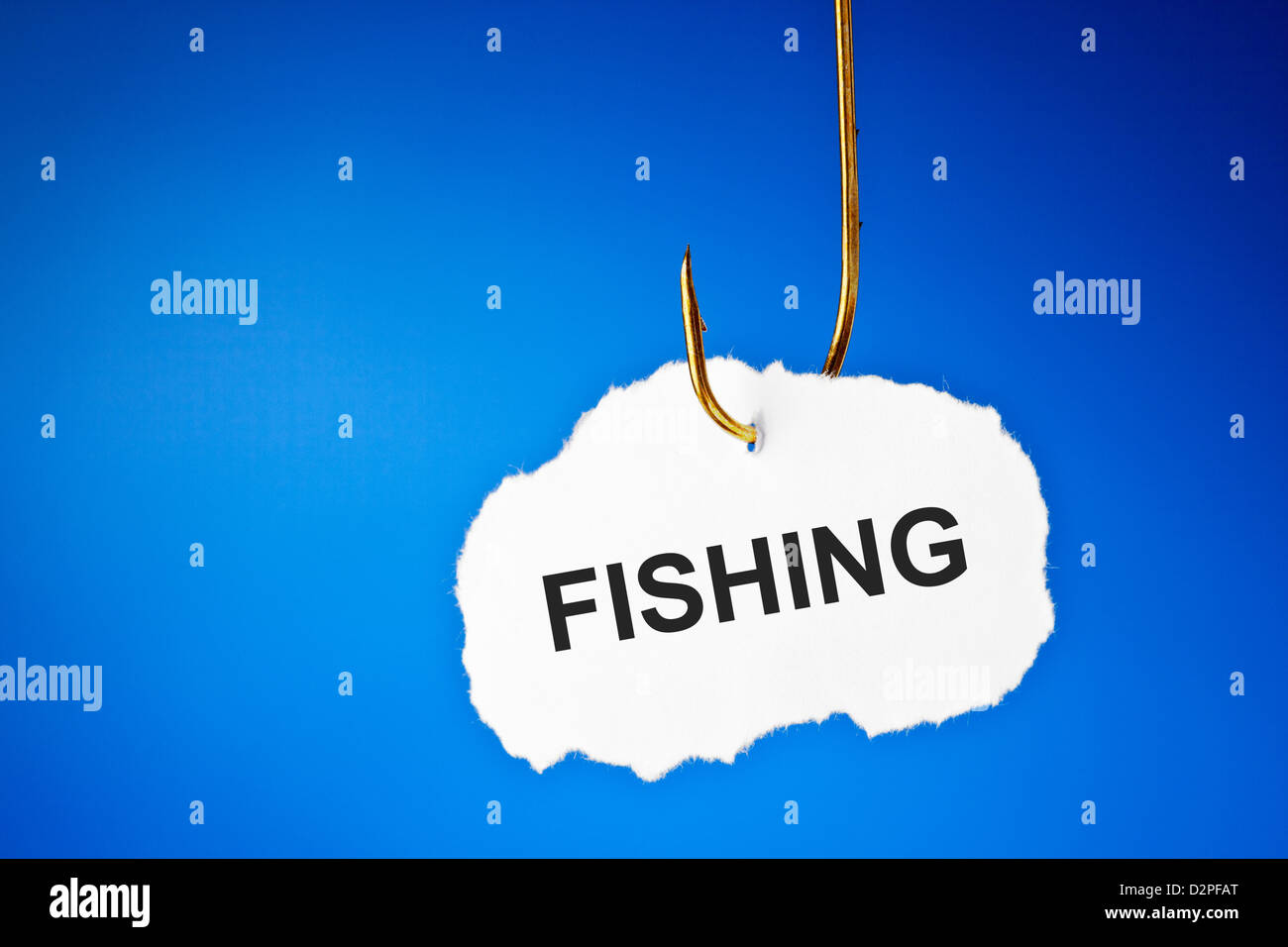 Fishing printed on white piece of paper hanging on a fishing hook over ...