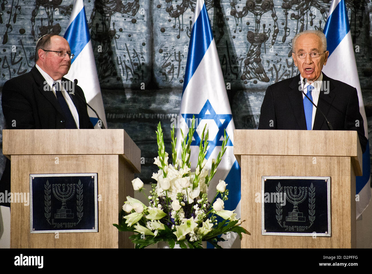 President Shimon Peres (R) thanks the Central Elections Committee and ...