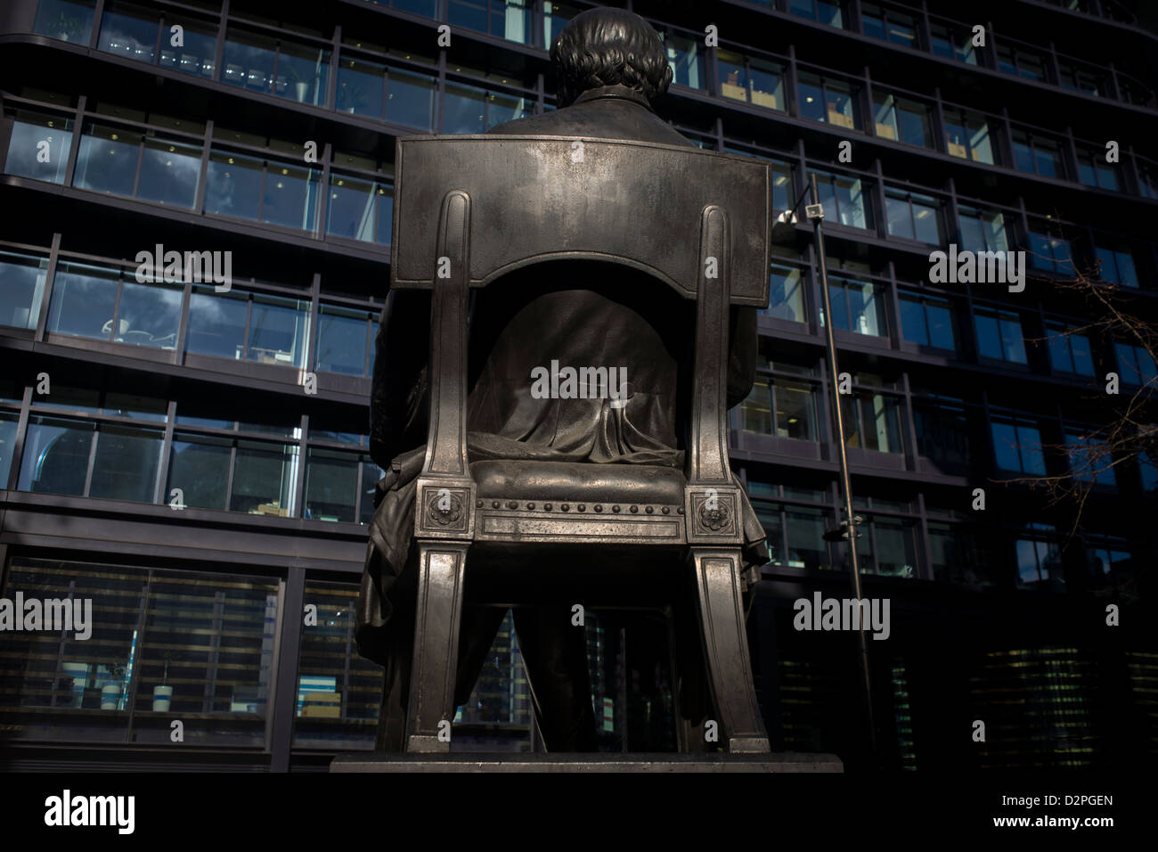 The rear of the statue of George Peabody and modern offices in the ...