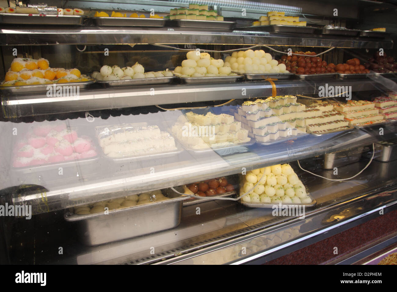 Indian sweets display in Indian a shop Stock Photo - Alamy