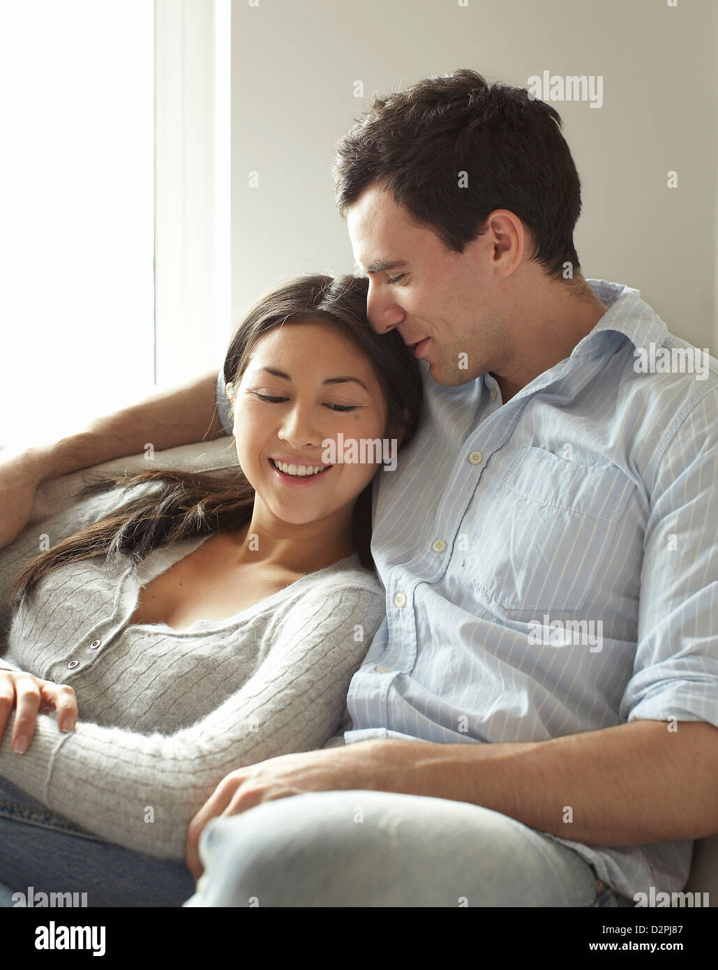 Couple relaxing together Stock Photo - Alamy