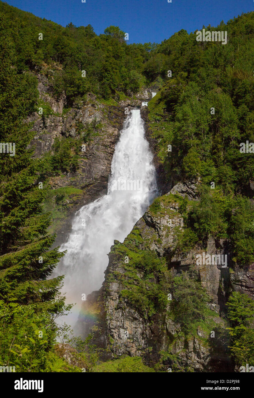 A waterfall and rainbow between Stalheim and Gudvangen, Norway, at the ...