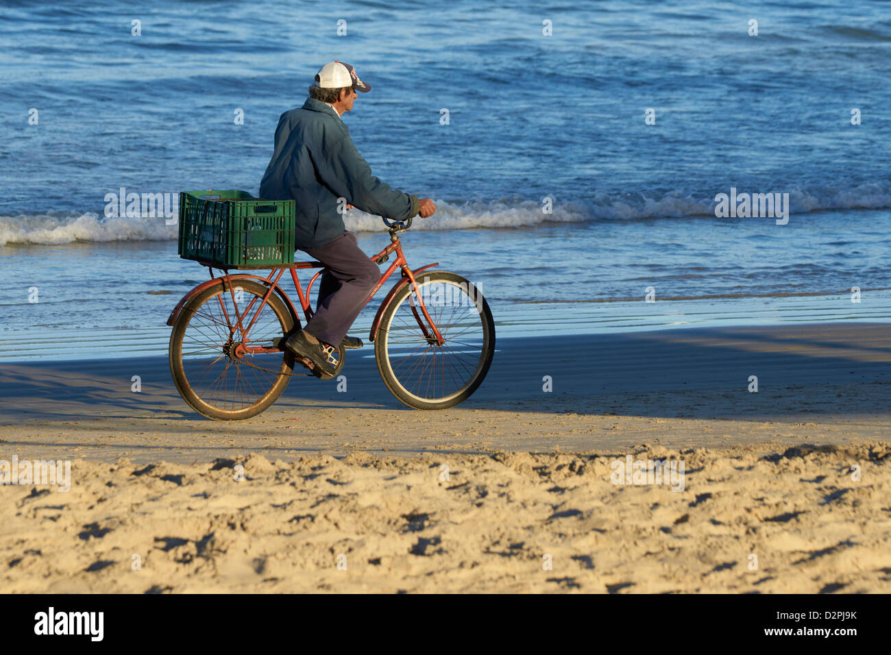 Biking on the beach Stock Photo - Alamy