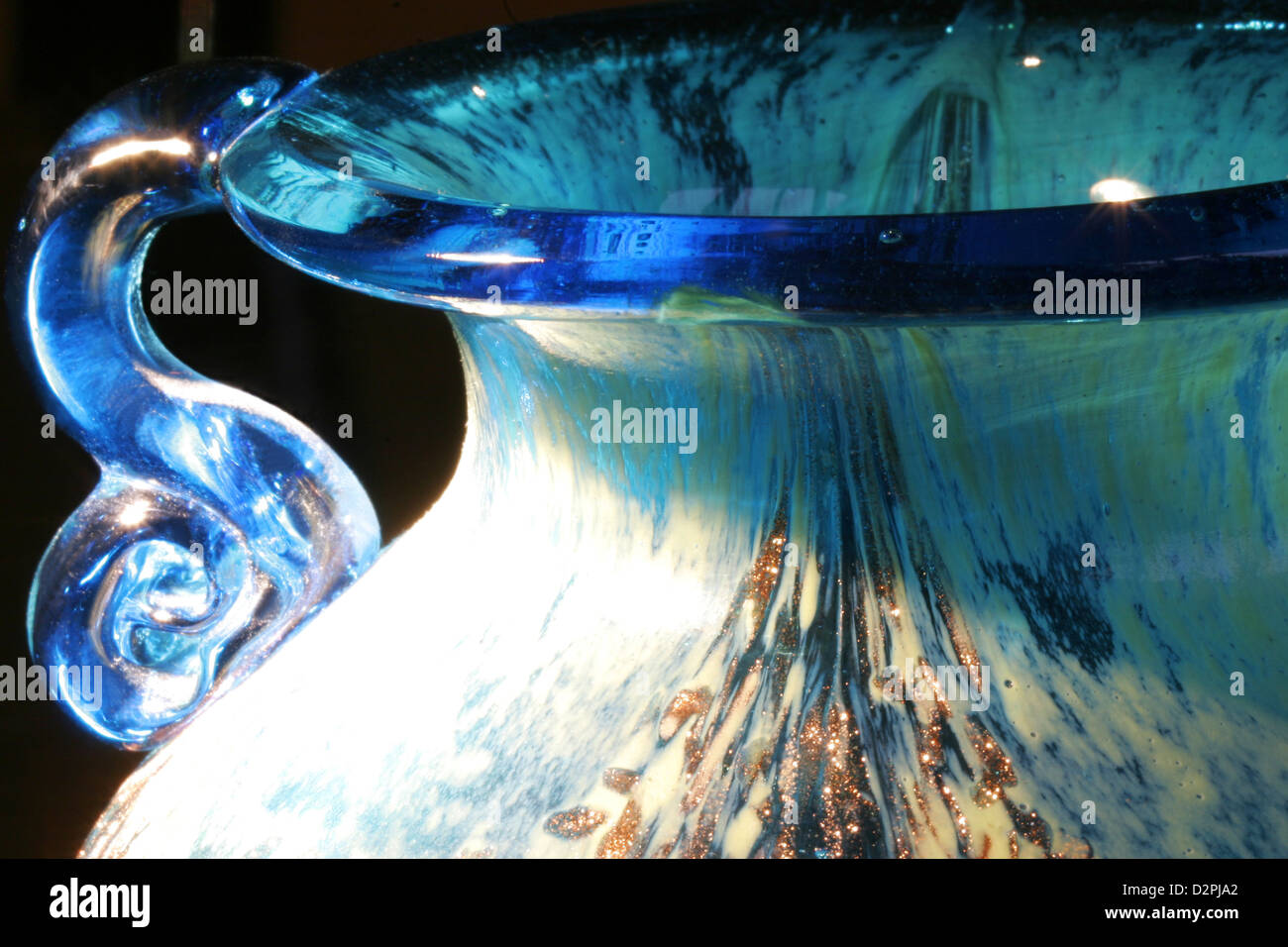 A close up view of a Maltese glass vase neck and handle Stock Photo - Alamy
