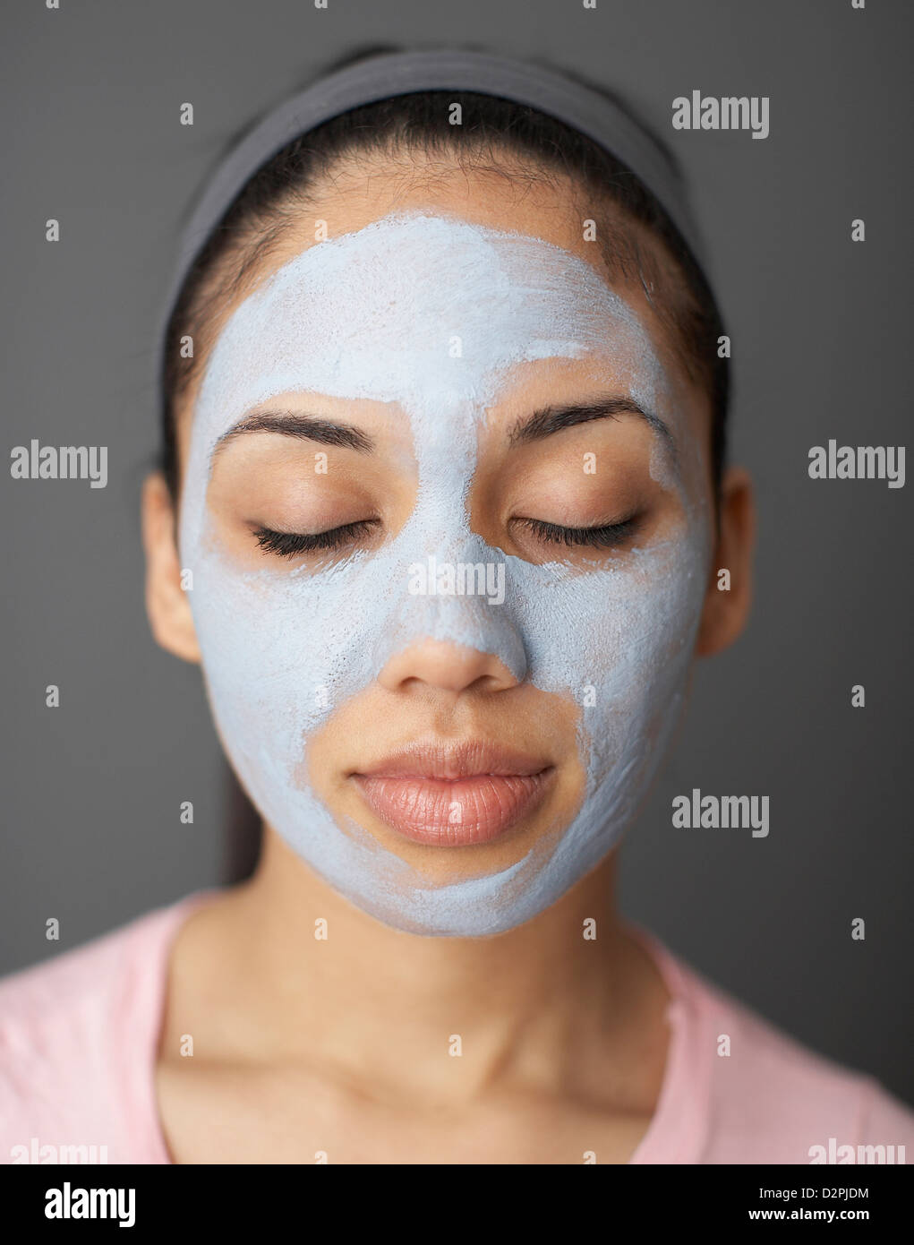Woman with facial mask Stock Photo - Alamy