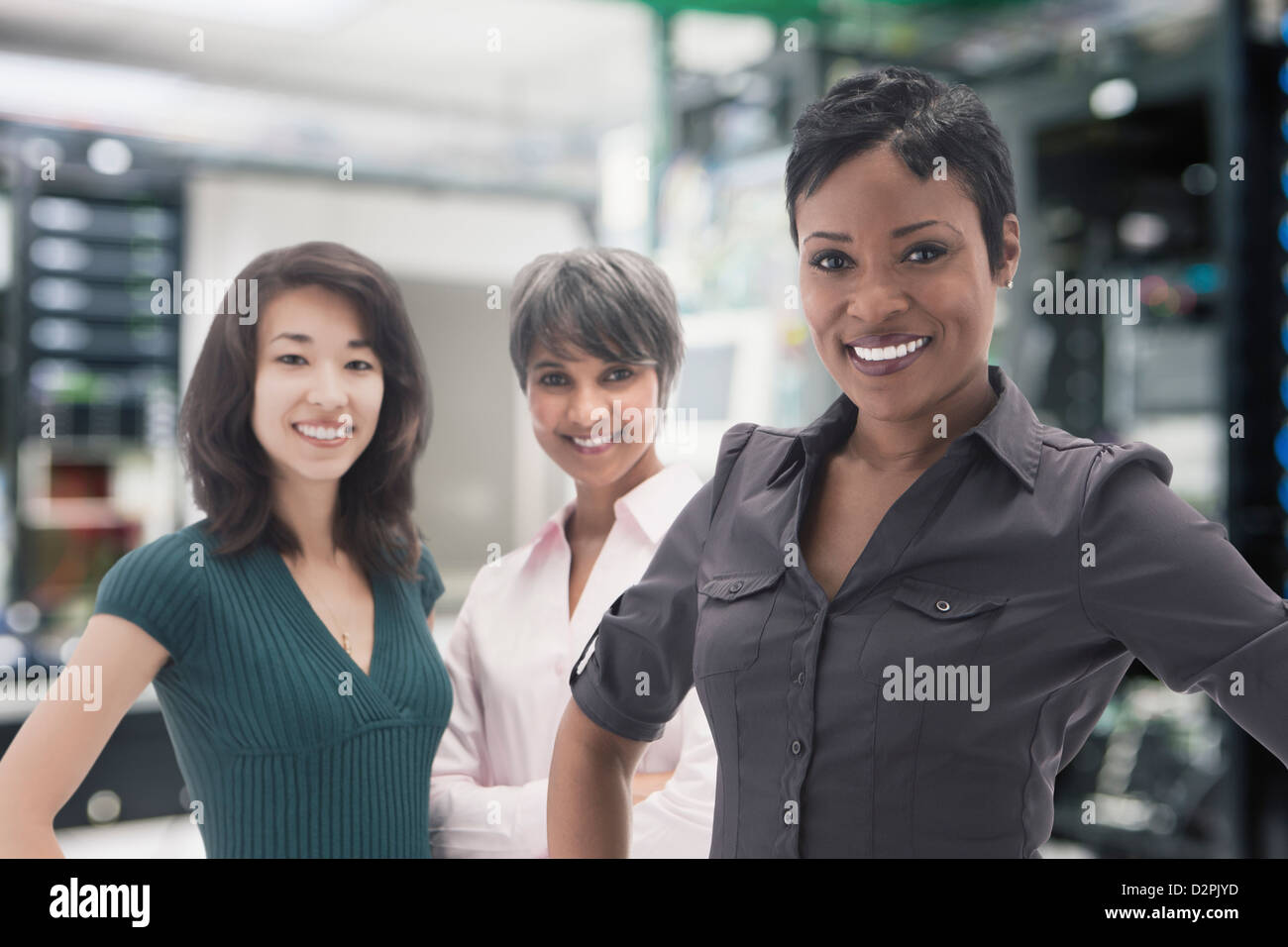 Businesswomen standing in server room Stock Photo - Alamy