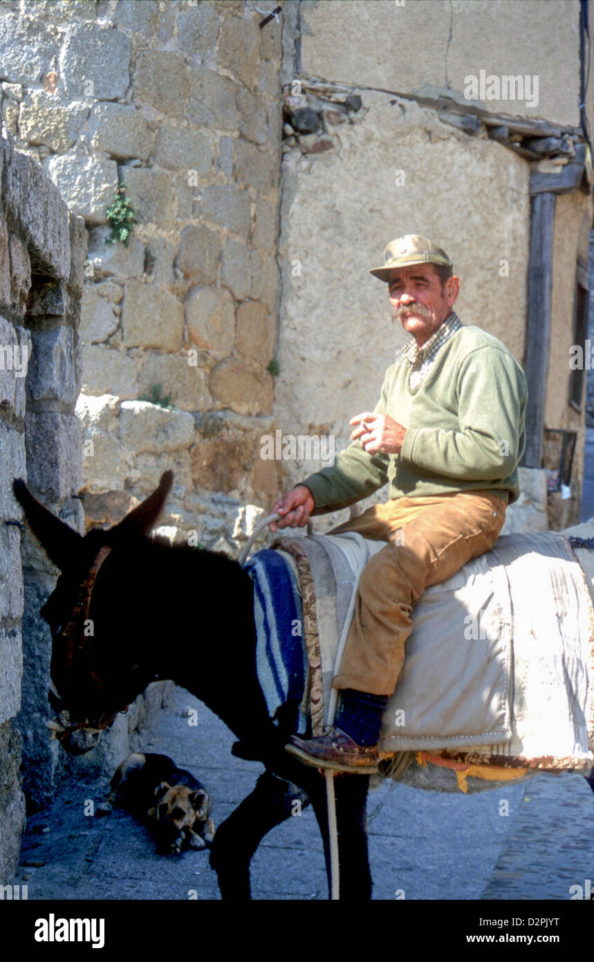 A village riding his mule in the remote Las Hurdes village of Miranda ...