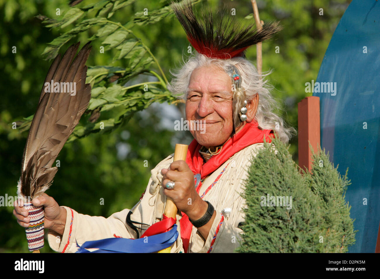 An American Indian Chief smiles in the sun during the Wichita River ...