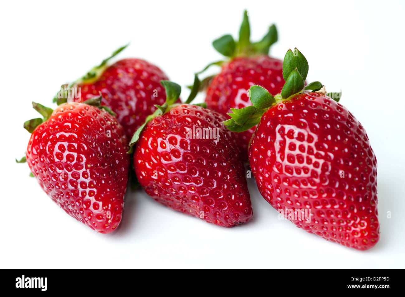 fresh strawberries on white background Stock Photo - Alamy