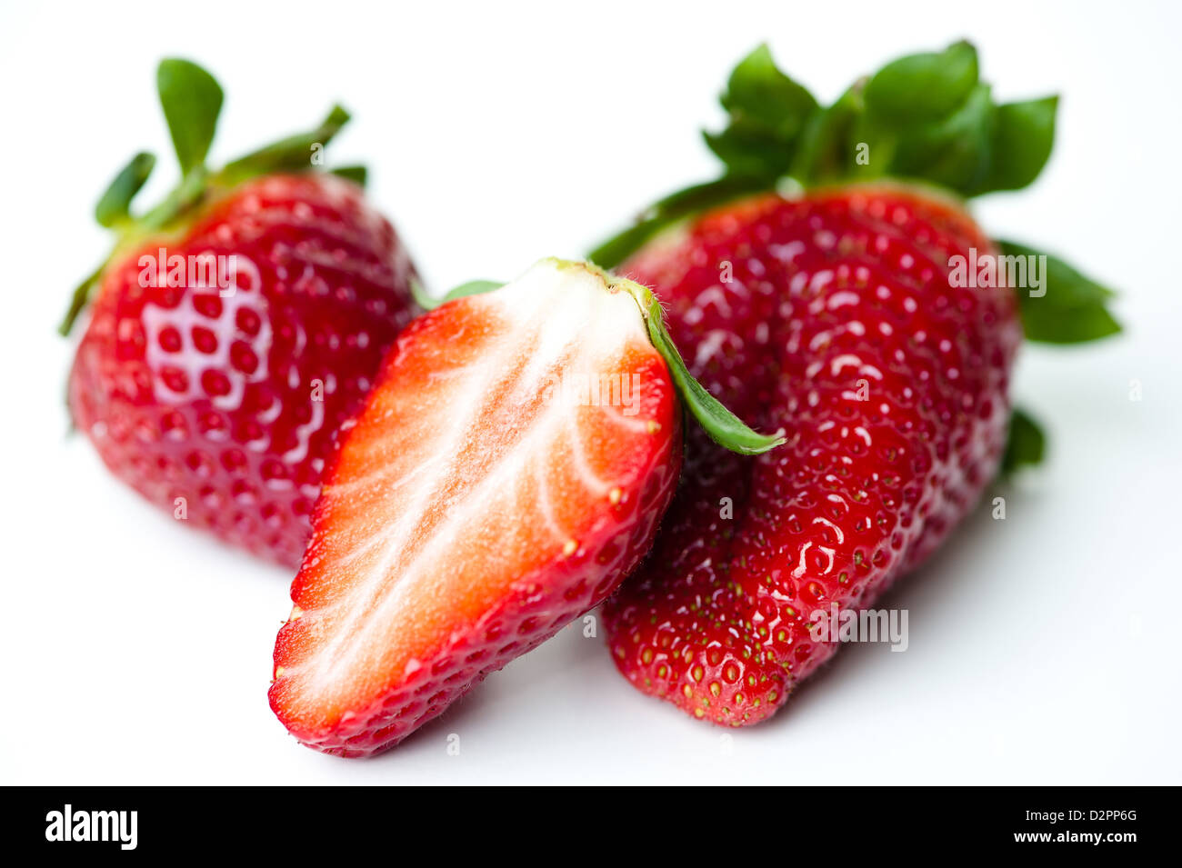 fresh strawberries on white background Stock Photo - Alamy
