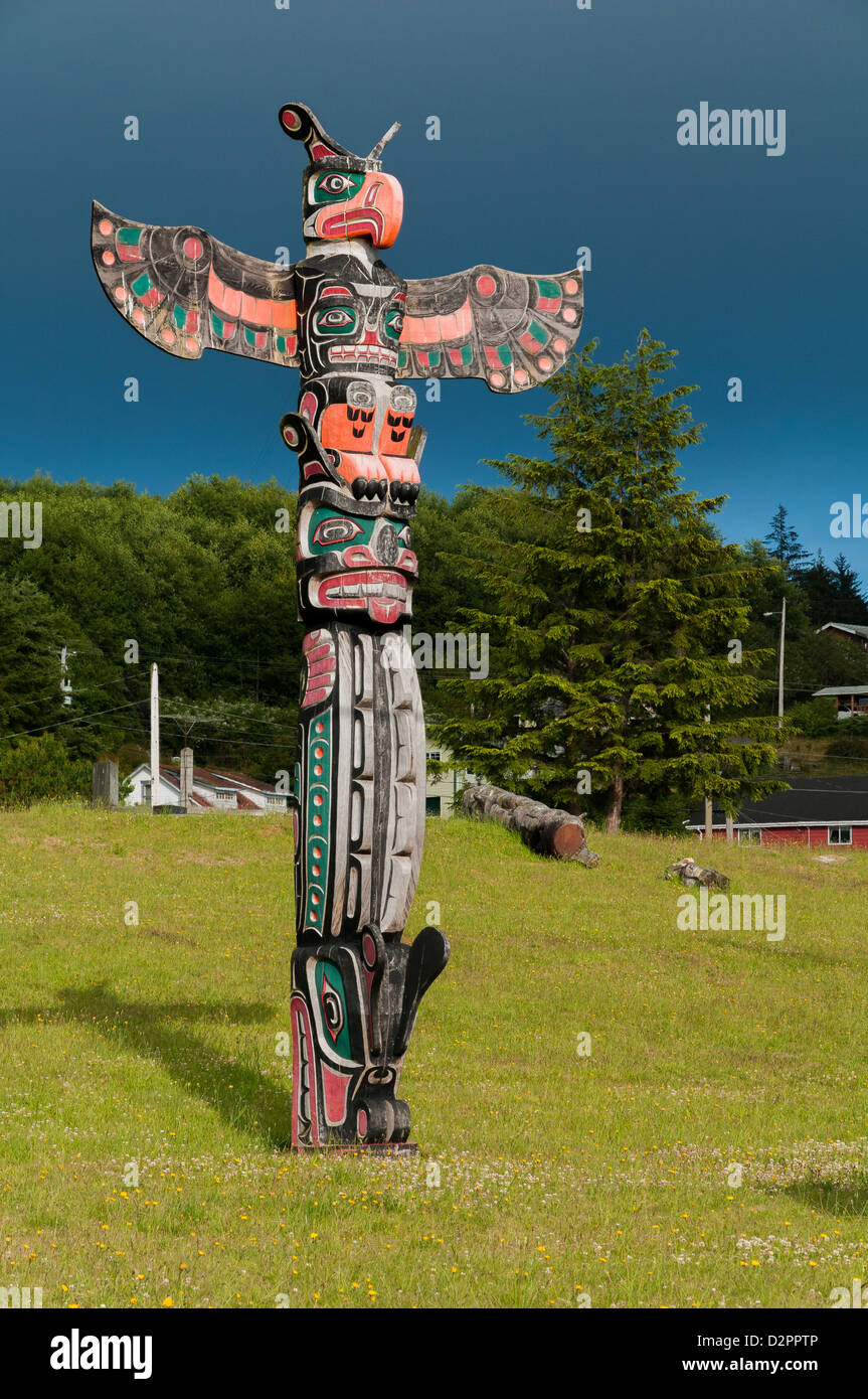 Totem poles in cemetary, Alert Bay, Cormorant Island, British Columbia ...