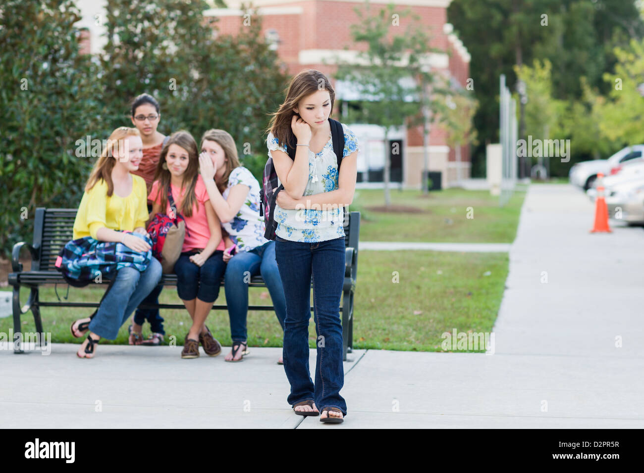 Girl being teased by other girls Stock Photo - Alamy