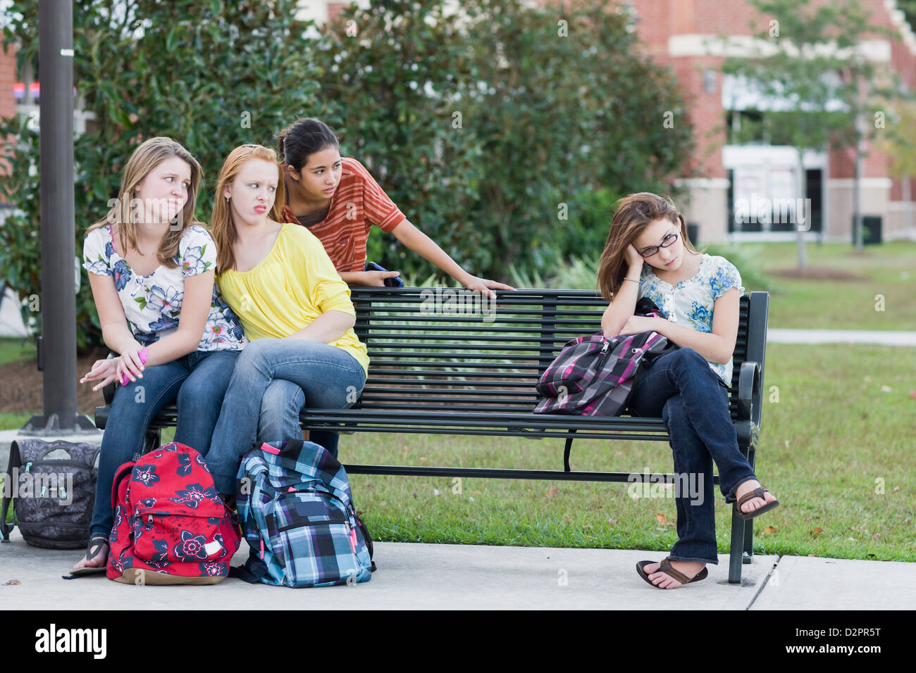 Girl being rejected by other girls Stock Photo - Alamy