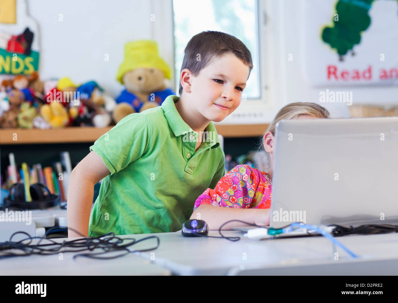 Two boys using laptop school hi-res stock photography and images - Alamy